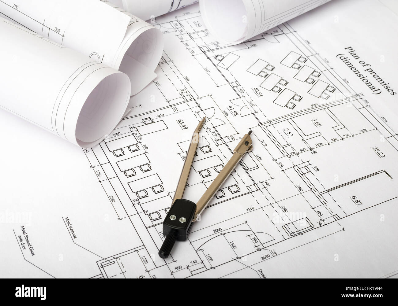 Blueprints and rolls of blueprints with divider. Building concept Stock ...