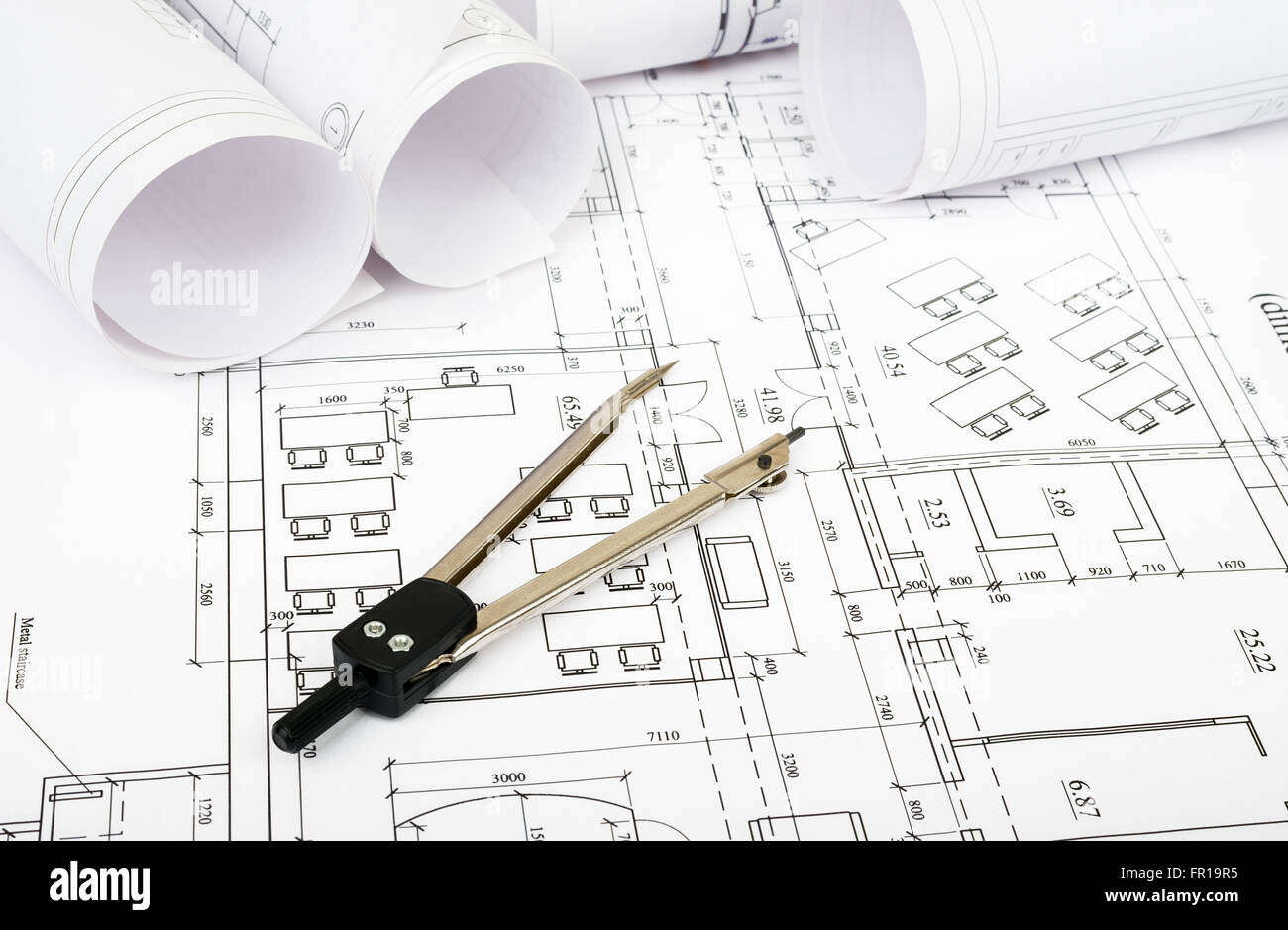 Blueprints and rolls of blueprints with divider. Building concept Stock ...