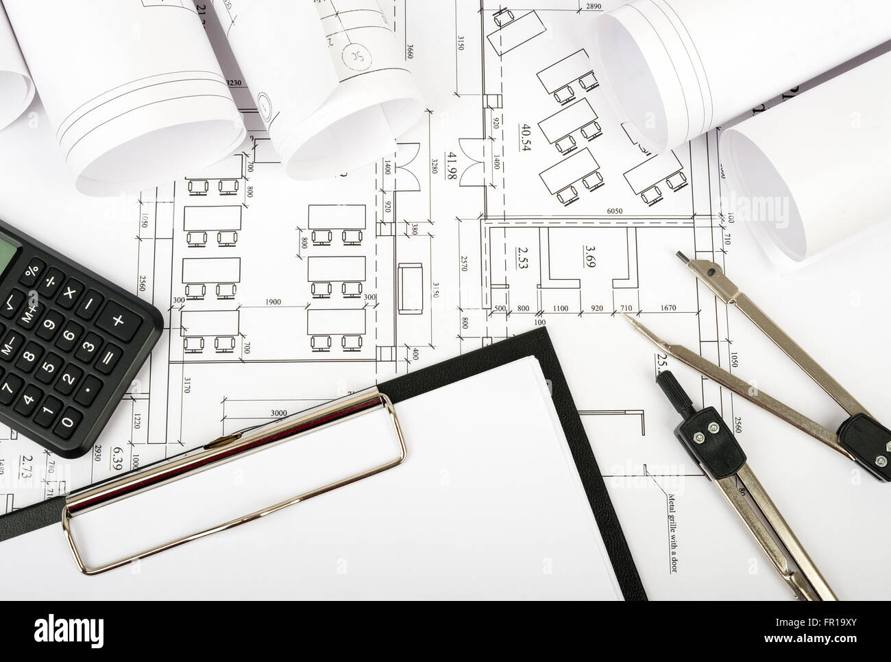 Rolls of blueprints with dividers and folder. Building concept Stock ...