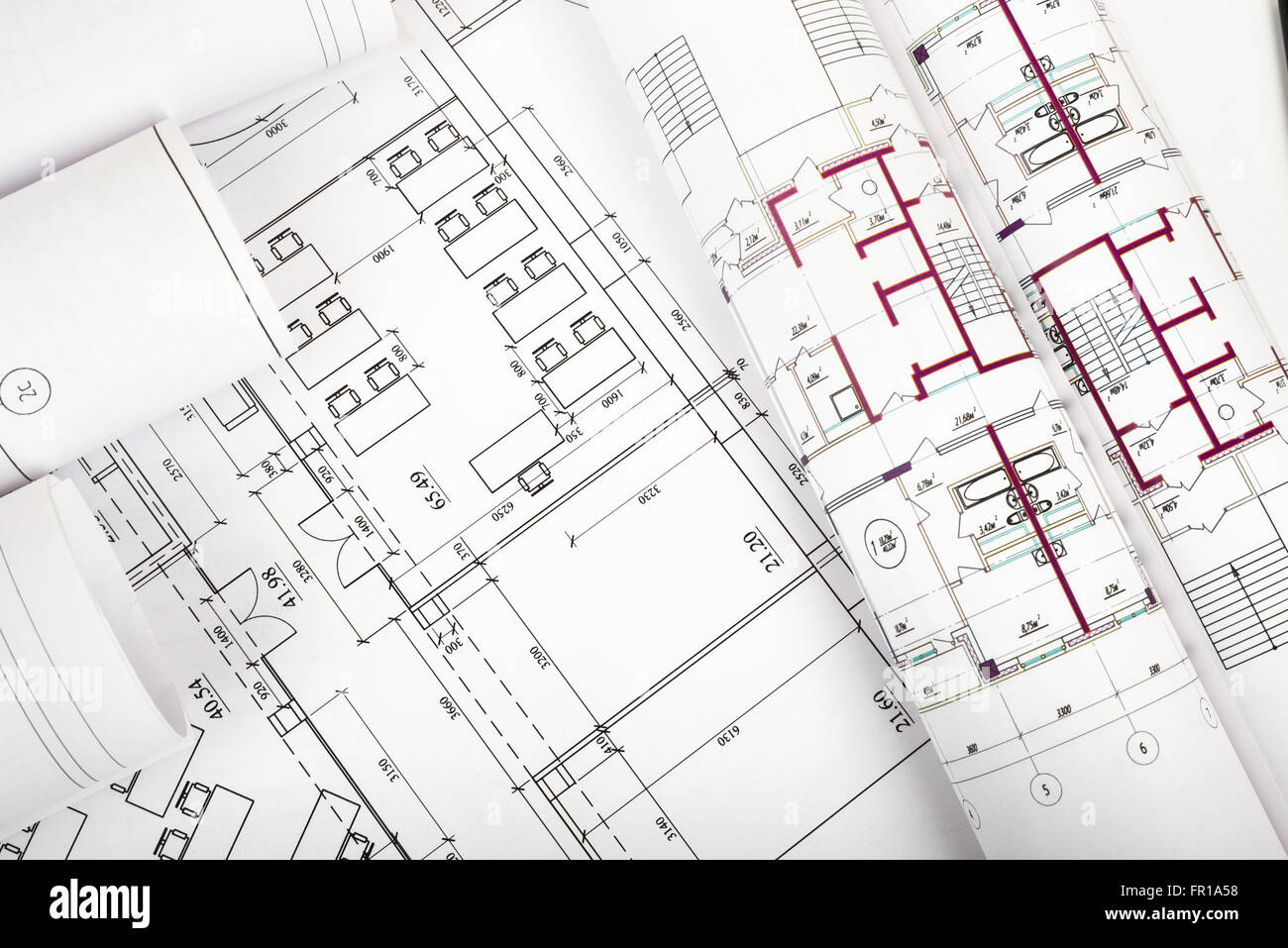 Rolls of blueprints, top view. Building concept Stock Photo - Alamy