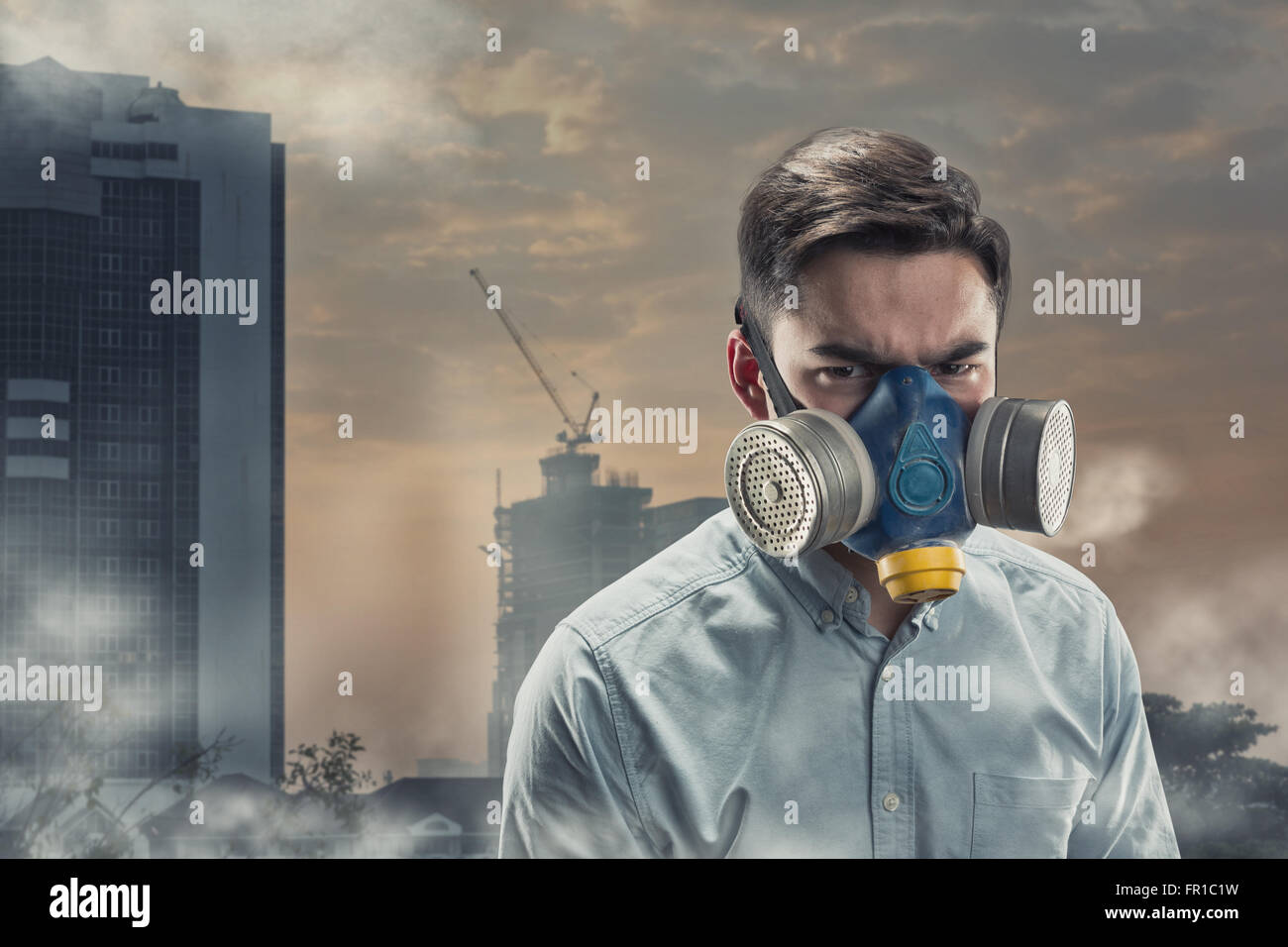 Young man hood gas mask hi-res stock photography and images - Alamy