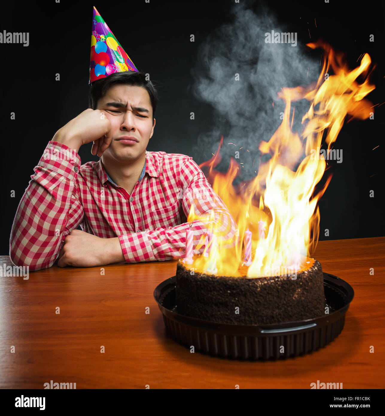 Sad birthday boy Stock Photo - Alamy