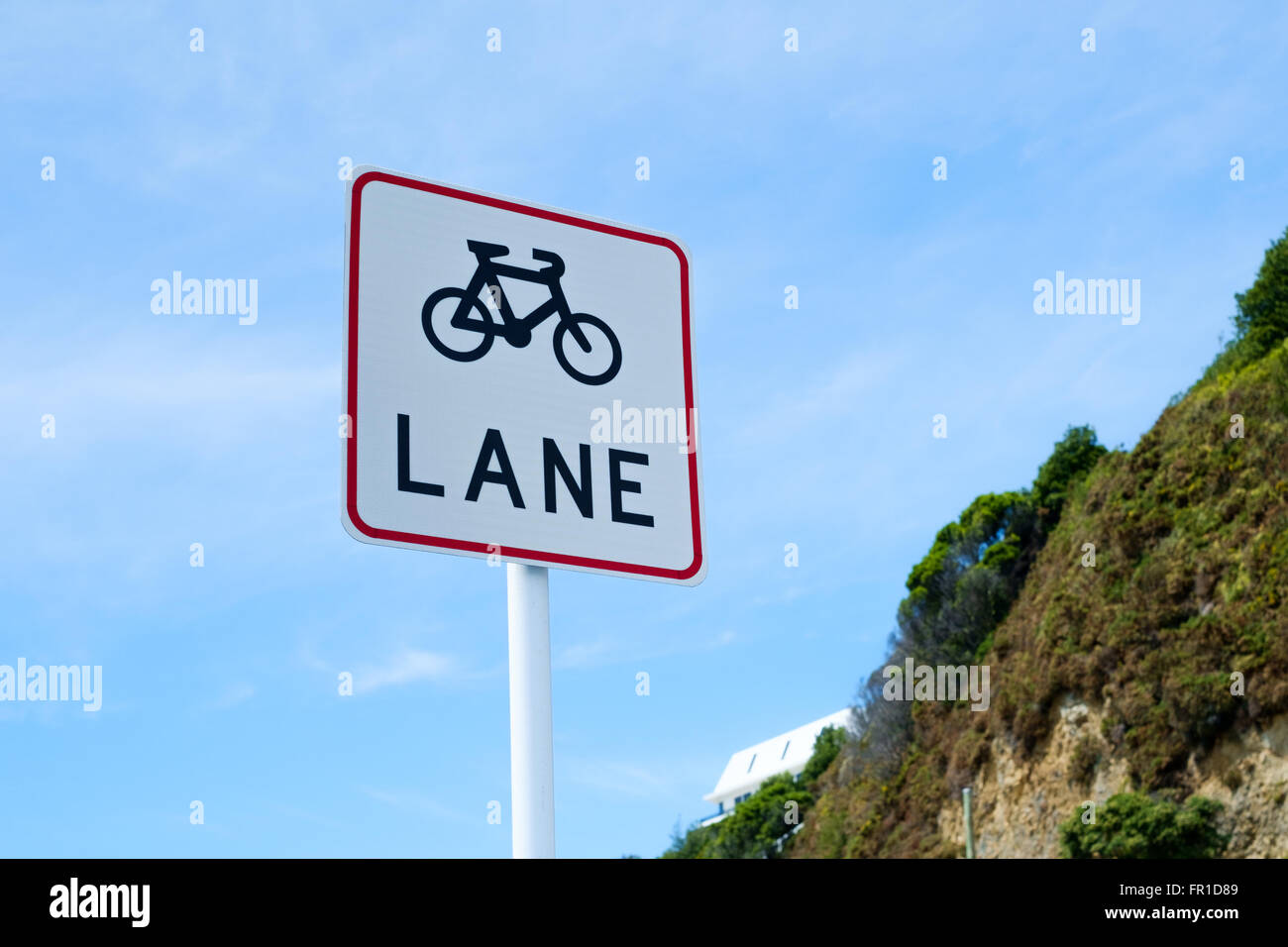 Square Cycle Lane Sign against blue sky Stock Photo - Alamy
