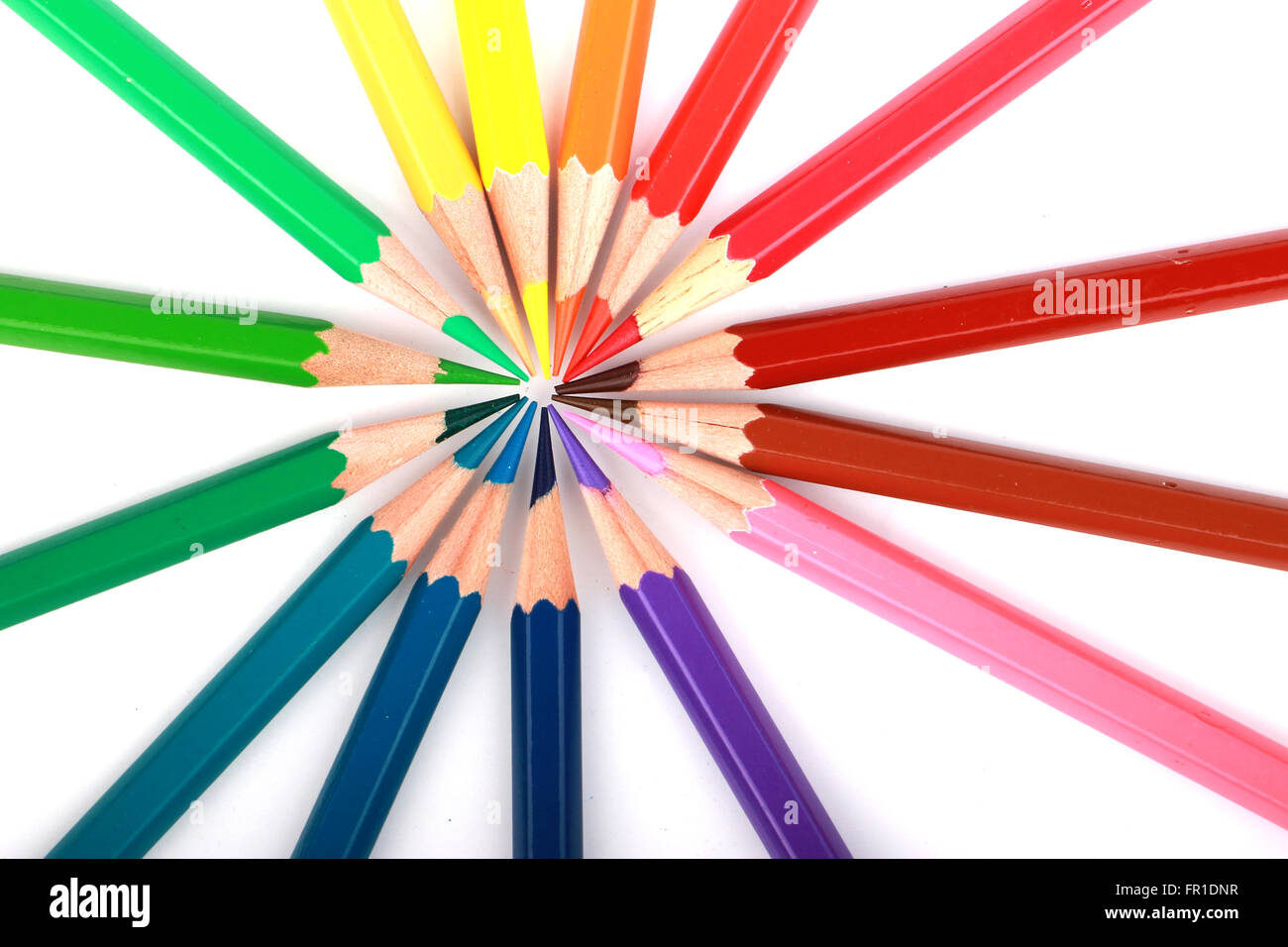 Colorful color pencil arranged in diagonal line on white background ...
