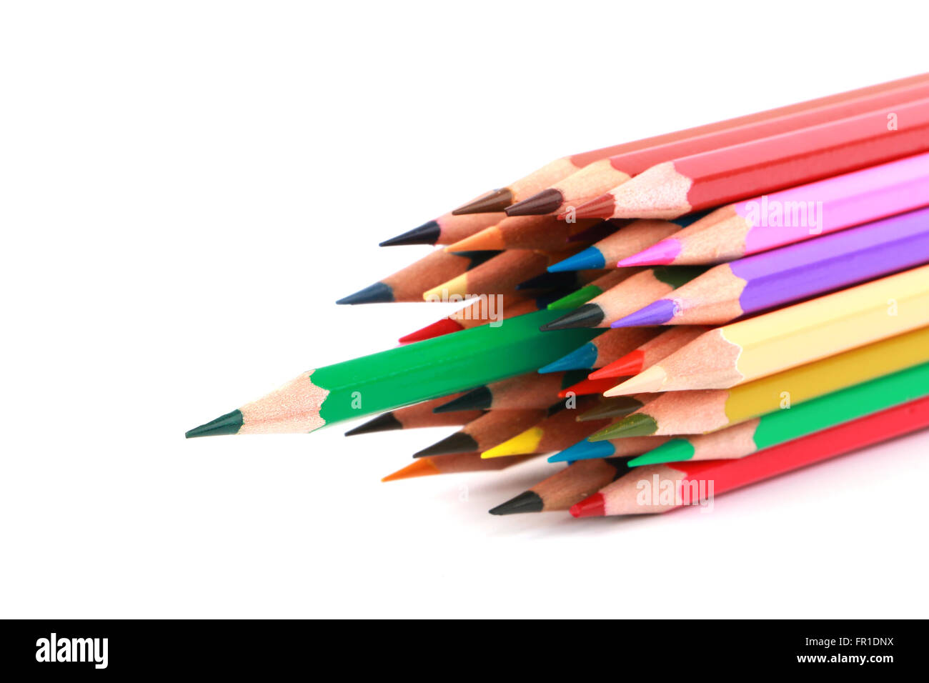 Colorful color pencil arranged in diagonal line on white background ...