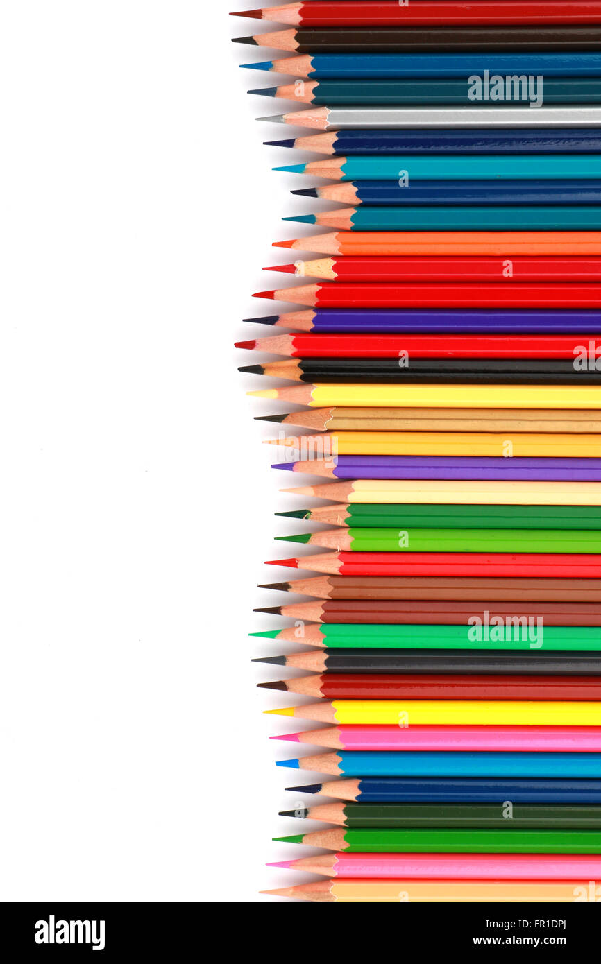Colorful color pencil arranged in diagonal line on white background ...