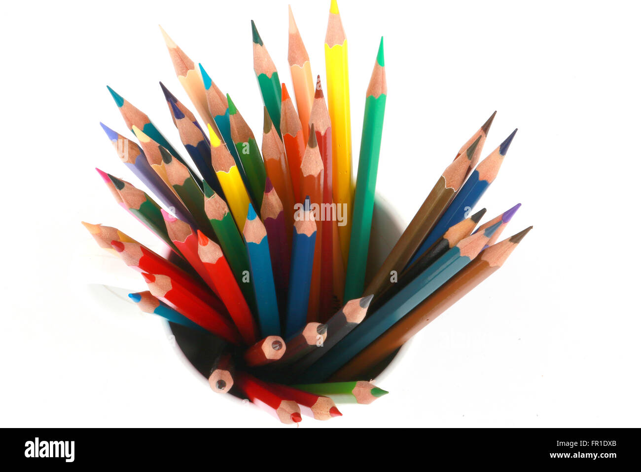 Colorful color pencil arranged in diagonal line on white background ...