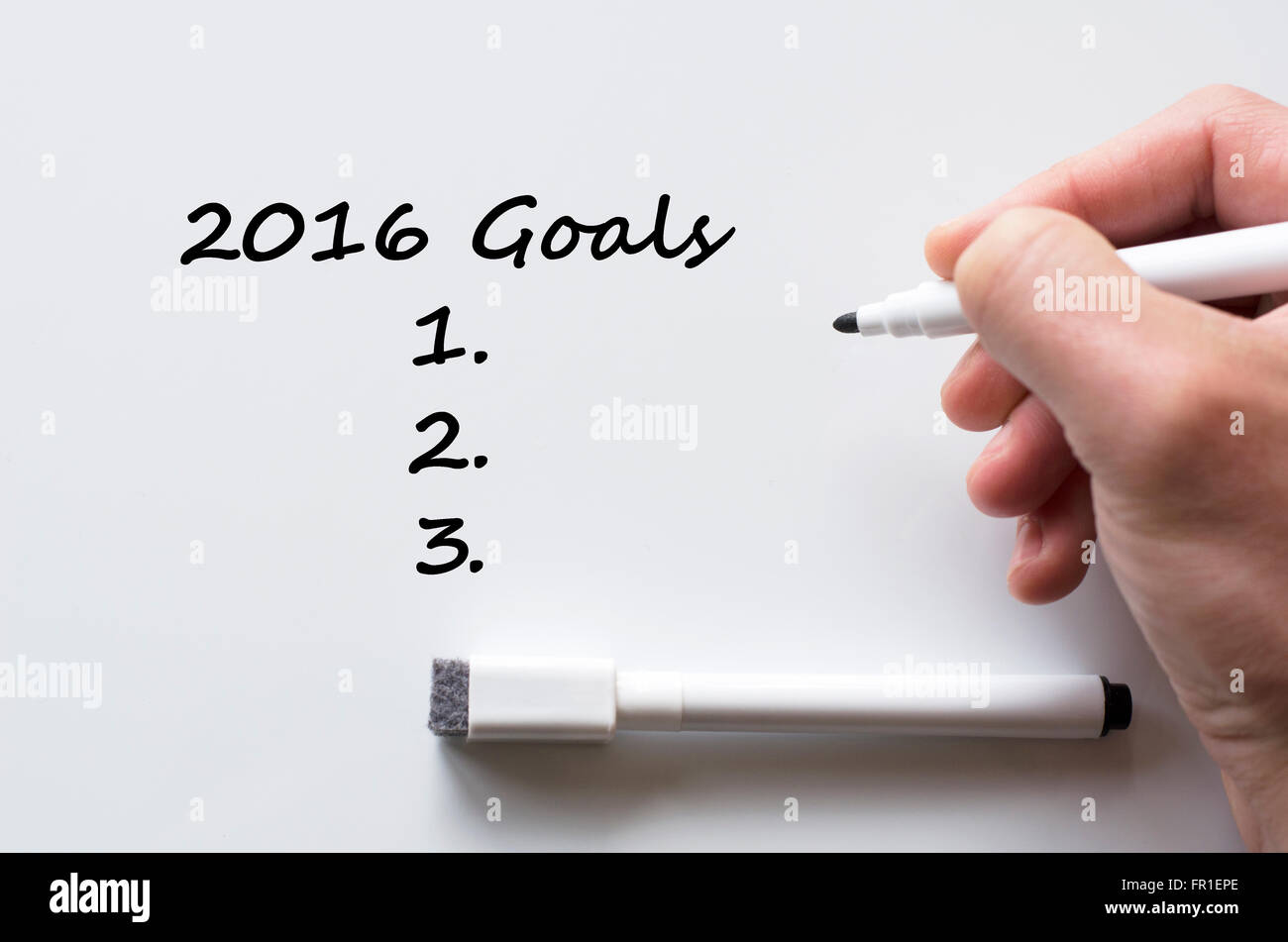 Human hand writing 2016 goals on whiteboard Stock Photo - Alamy