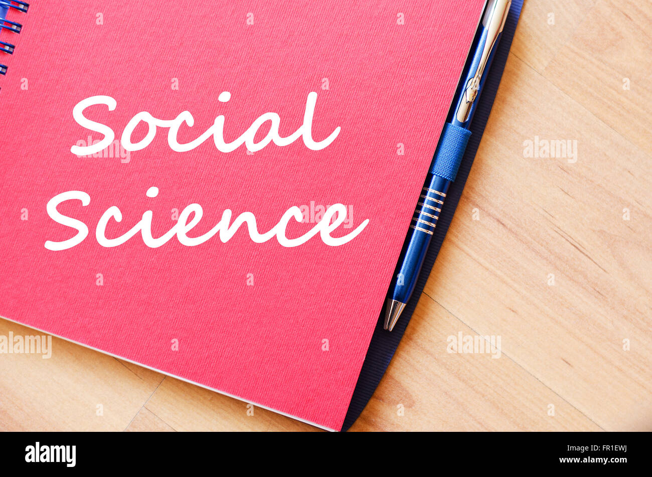Social science text concept write on notebook with pen Stock Photo - Alamy