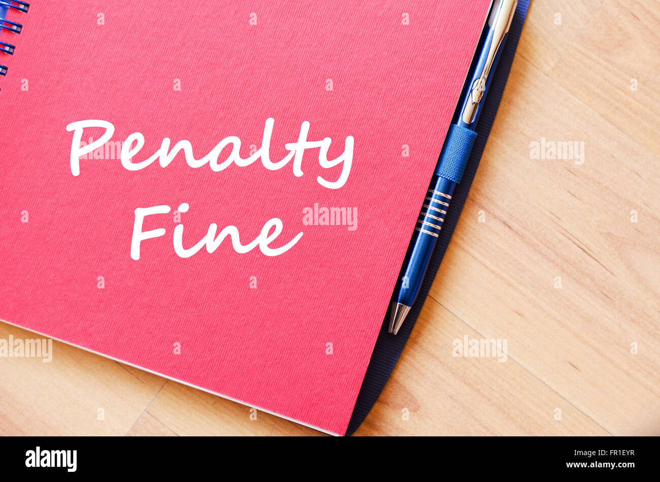 Penalty fine text concept write on notebook with pen Stock Photo - Alamy
