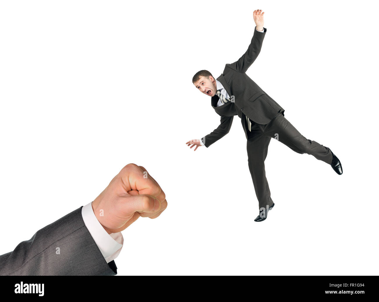 Businessman flying from fist hitting Stock Photo - Alamy