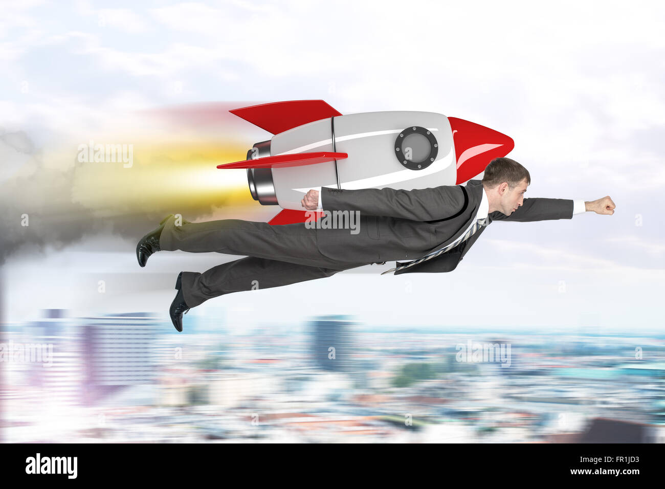 Businessman flying with rocket Stock Photo - Alamy