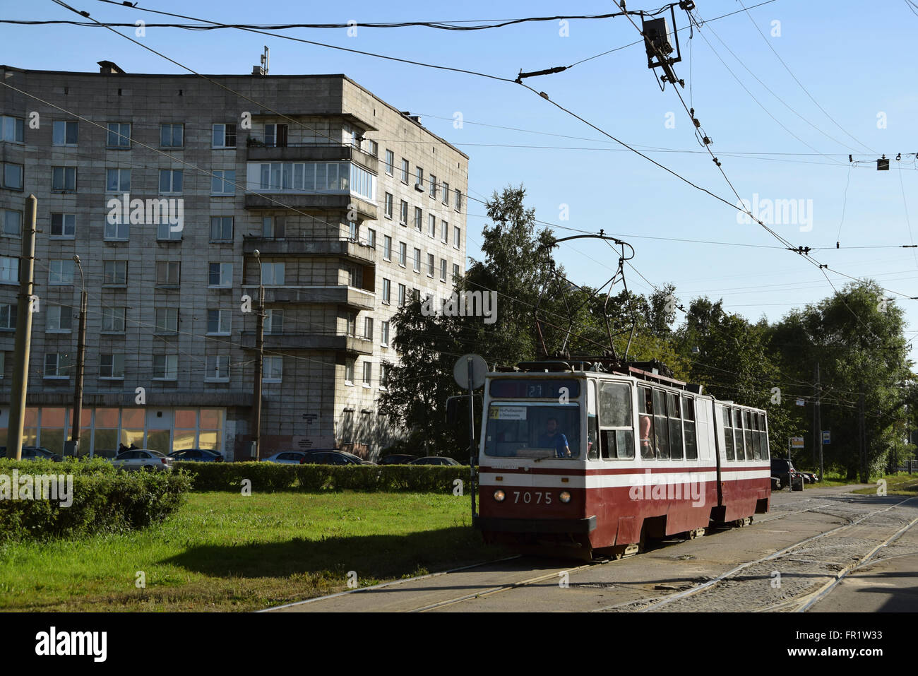Center-bound articulated LVS-86 tram passing the ring of "Tram Depot No ...