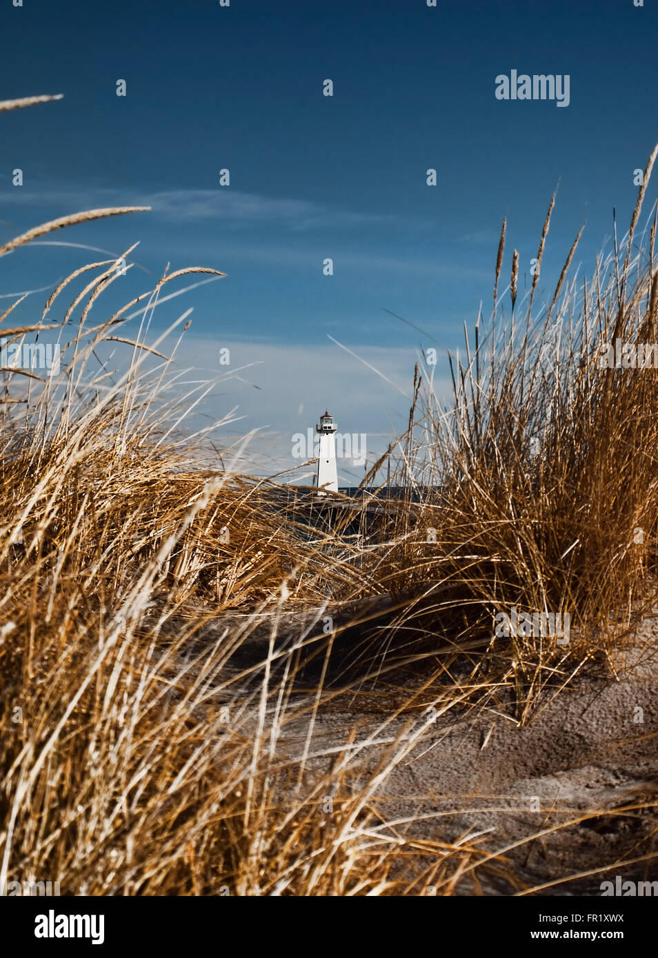 lighthouse in the distance Stock Photo - Alamy