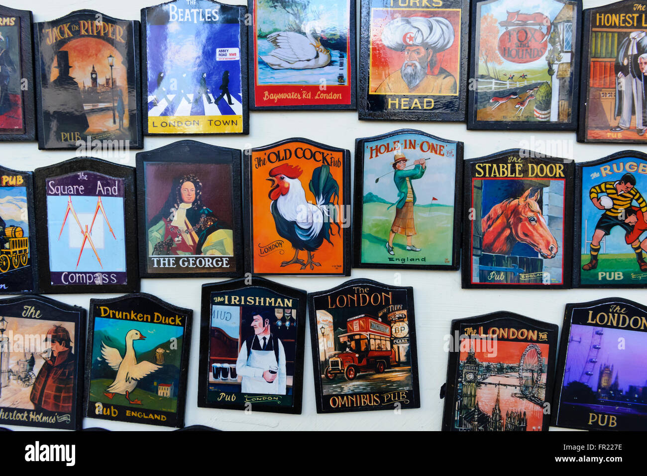 Colourful small cards of Pubs logo and names on display for sale along ...