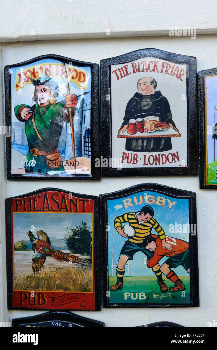 Colourful small cards of Pubs logo and names on display for sale along ...