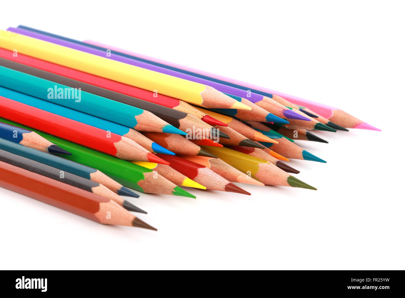 Colorful color pencil arranged in diagonal line on white background ...