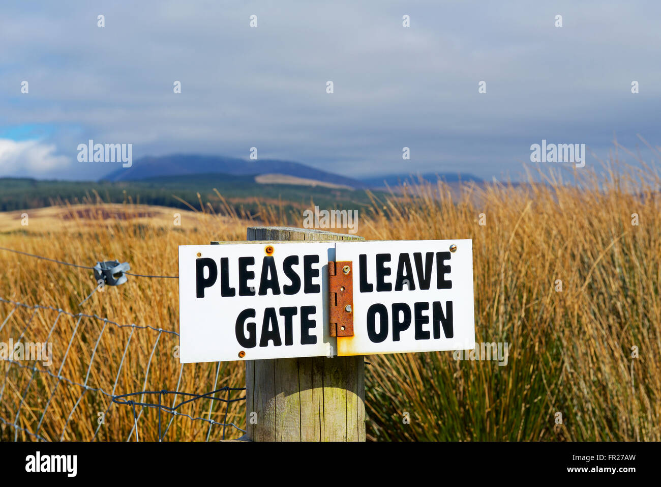 Sign - Please leave gate open - on fence post, Scotland UK Stock Photo ...