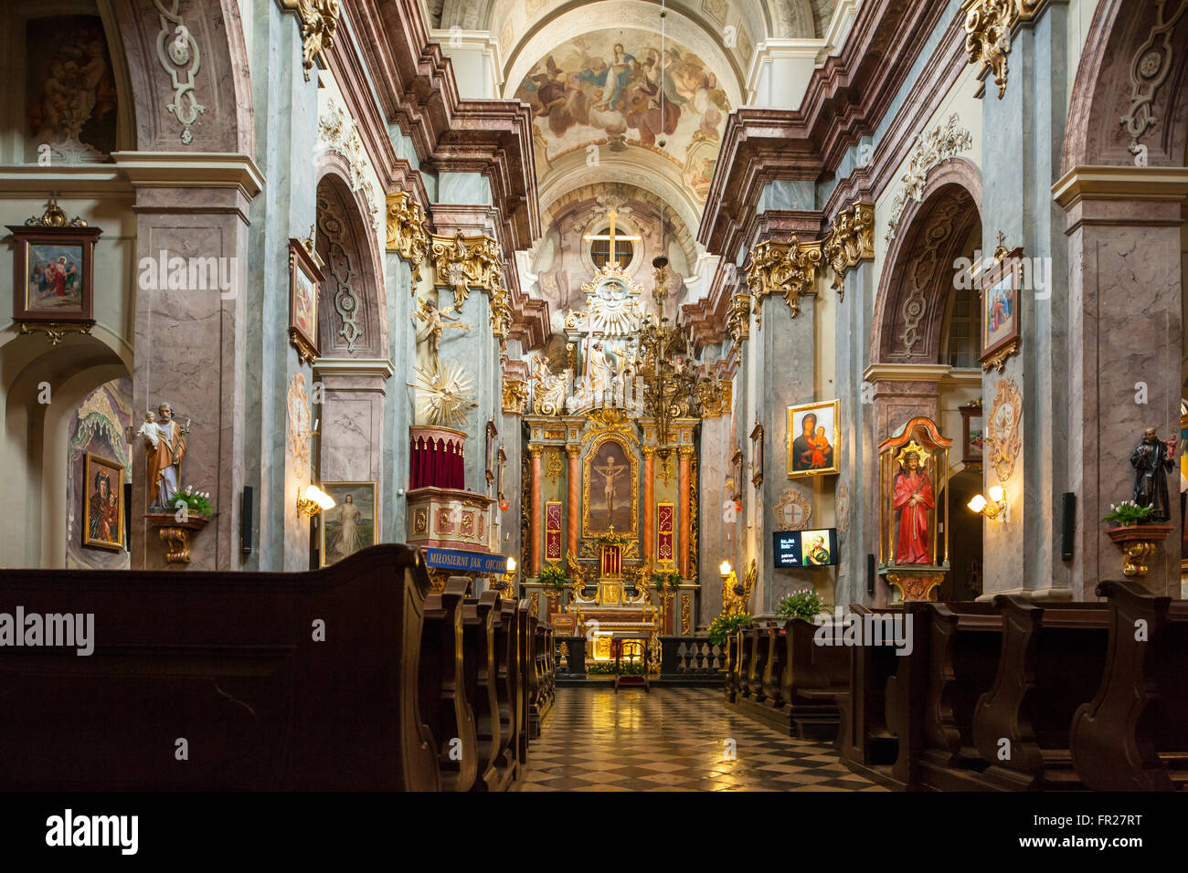 Baroque interior of Holy Trinity church in Kazimierz, Krakow, Poland ...
