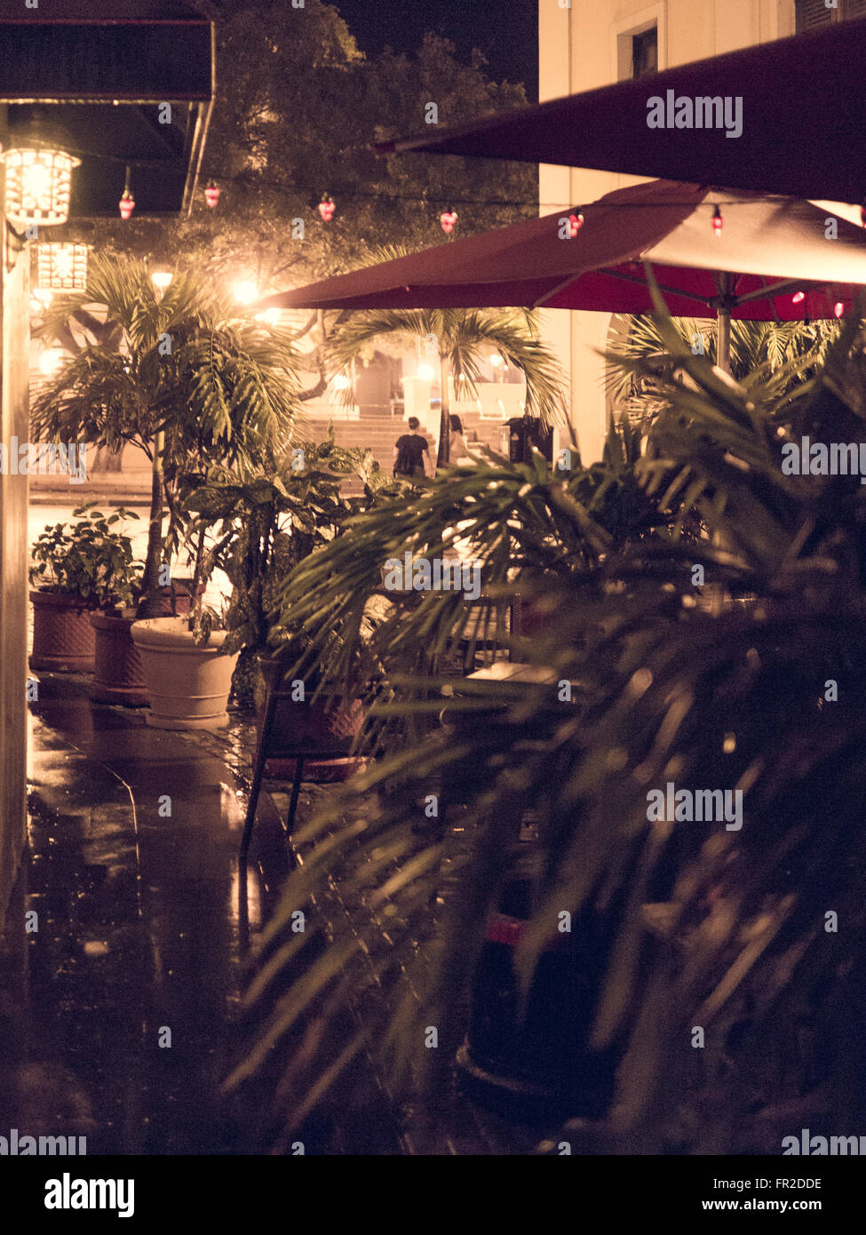 People hiding from rain Stock Photo - Alamy