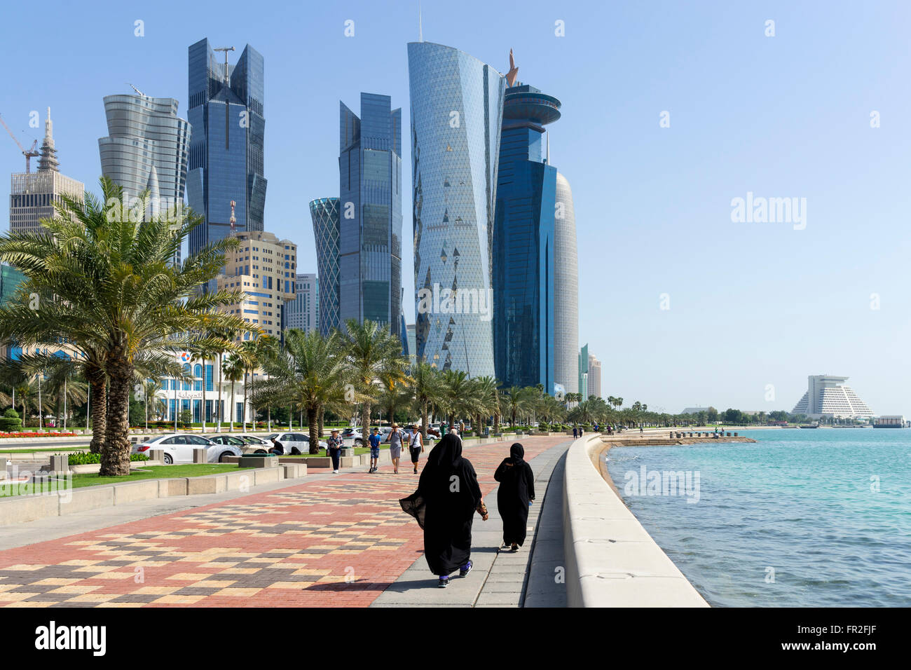 View along waterfront of Corniche towards modern office towers in West ...