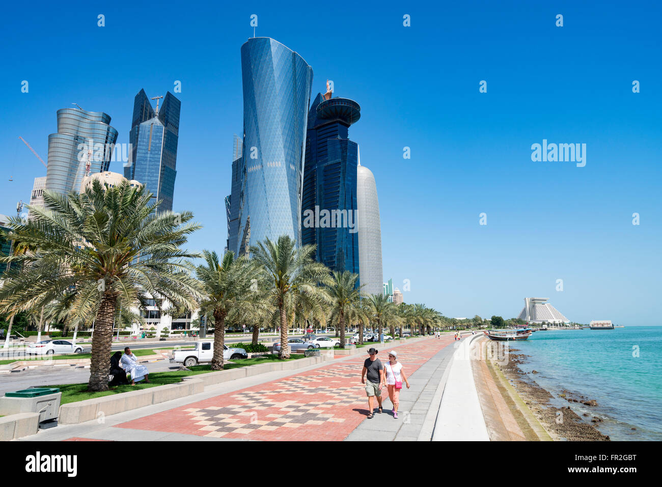 View along waterfront of Corniche towards modern office towers in West ...