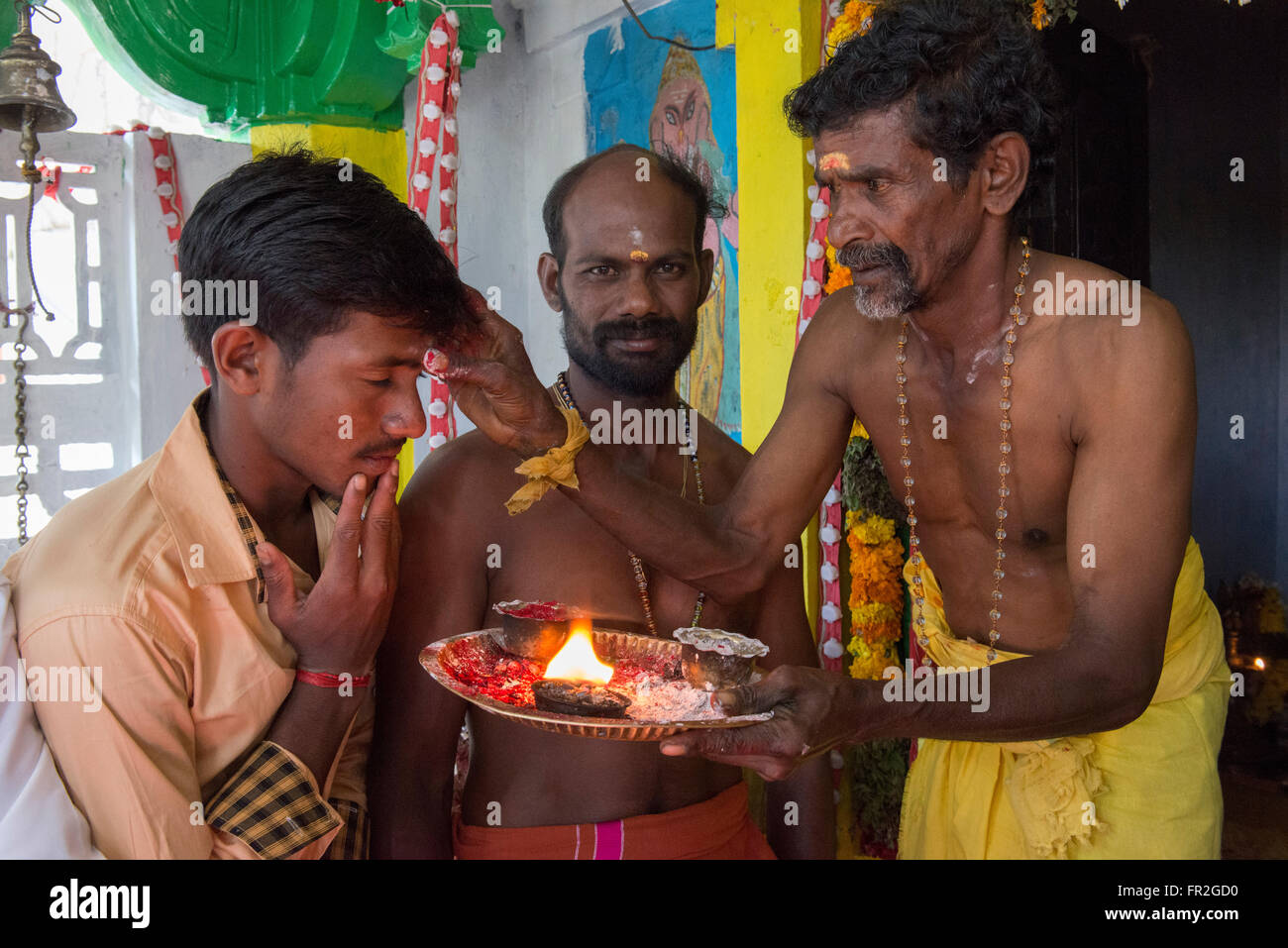 Man Being Blessed By Priest At Village Temple, Idukki Stock Photo - Alamy