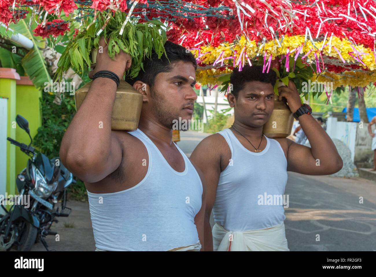 Two Men, Village Ceremony, Munroe Island Stock Photo - Alamy