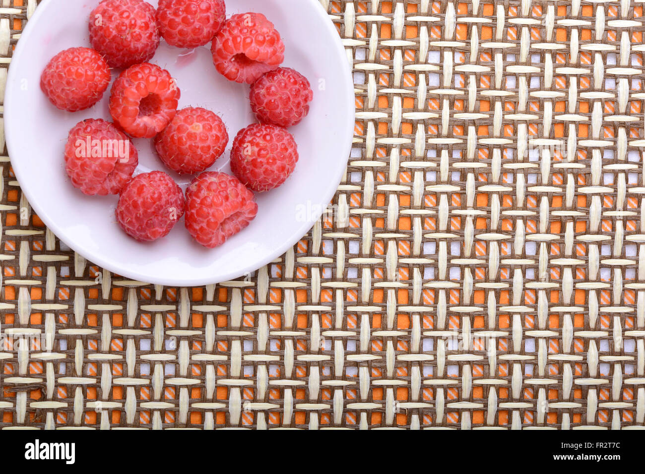 Raspberries in transparent bowl hi-res stock photography and images - Alamy