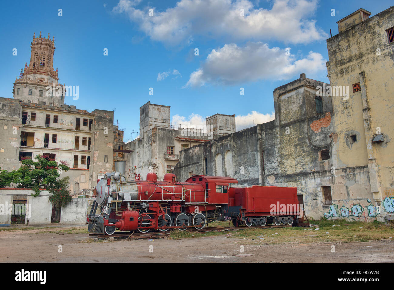 A bright red vintage steam engine acts as a reminder of a not-too ...