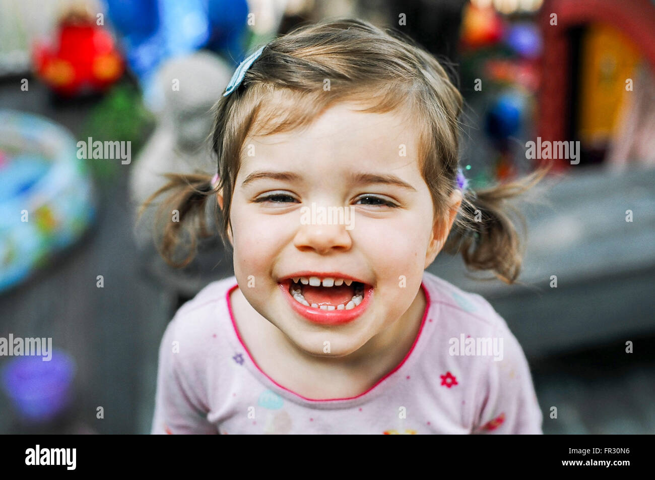 LOS ANGELES, CA – May 21: 3 year old caucasian girl laughing in Los ...