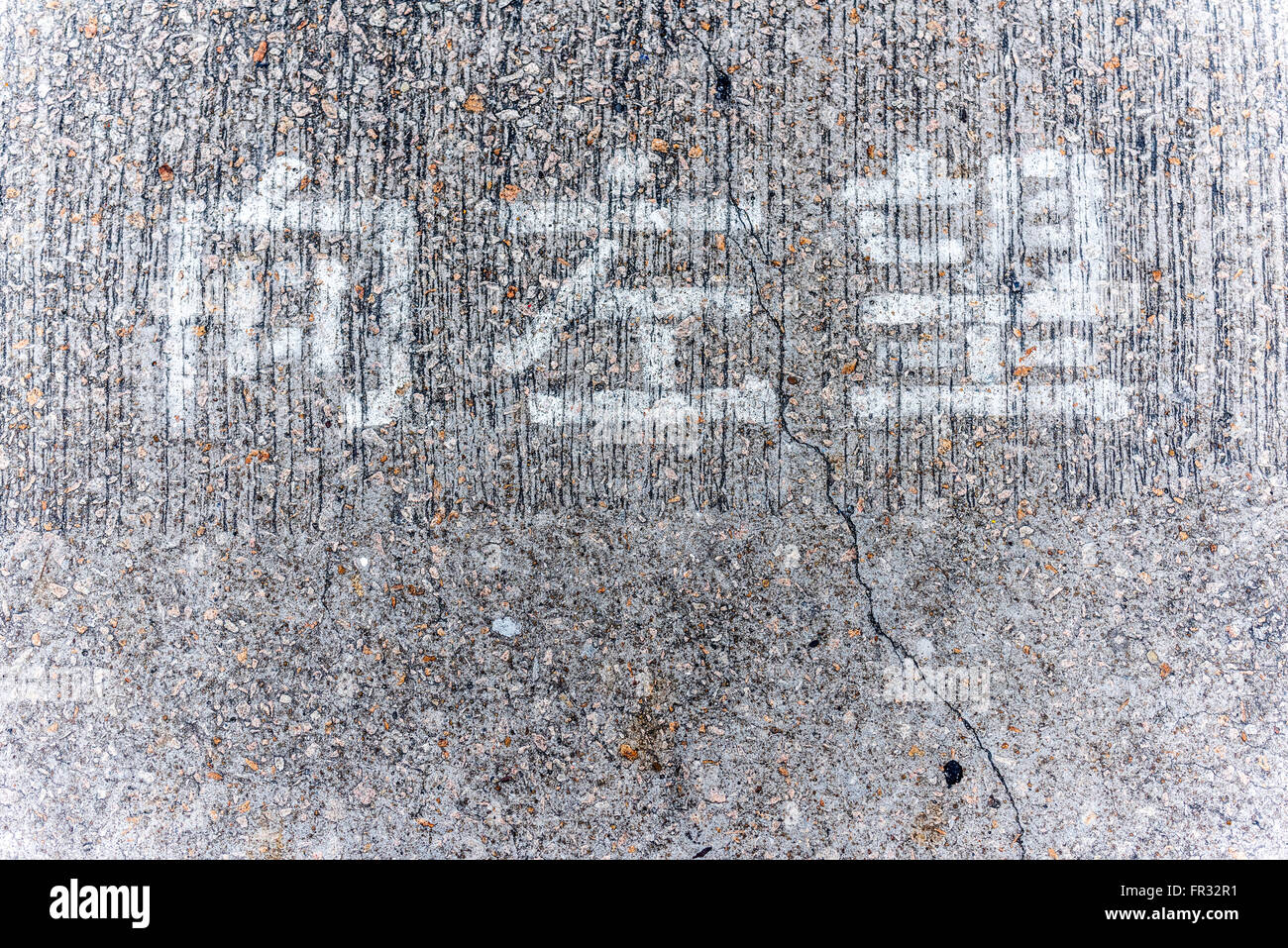 The chinese word LOOK LEFT sign on the road Stock Photo - Alamy