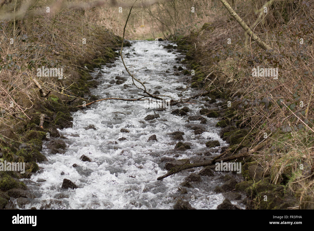 fast flowing stream over rocks Stock Photo - Alamy