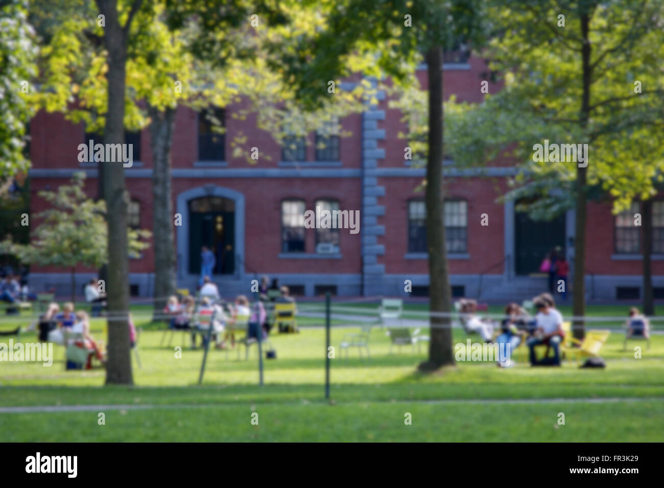 Blurred background of university campus scene Stock Photo - Alamy