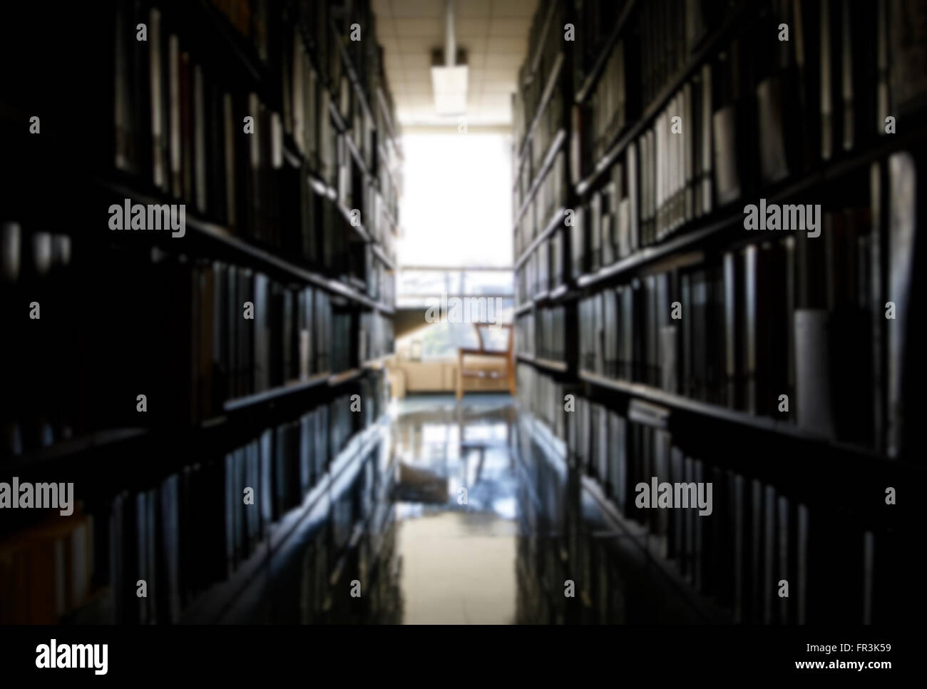 Blurred background of workplace at university library Stock Photo - Alamy