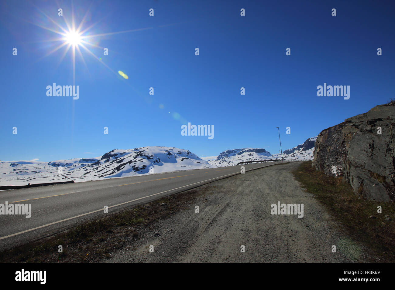 Spring valley landscape with mountains and melting snow, Norway Stock ...