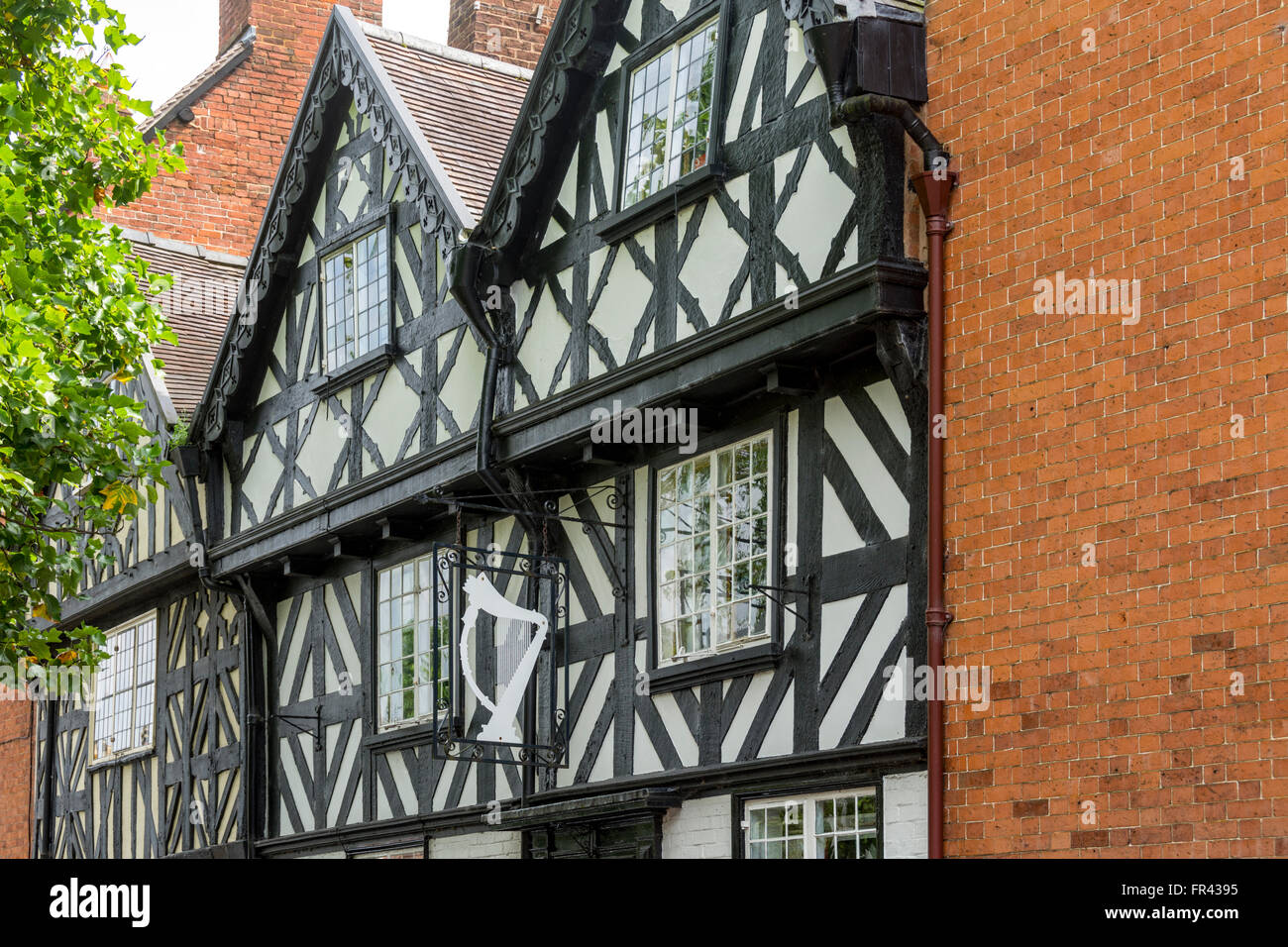 Timber-framed building with a harp sign, Dinham, Ludlow, Shropshire ...