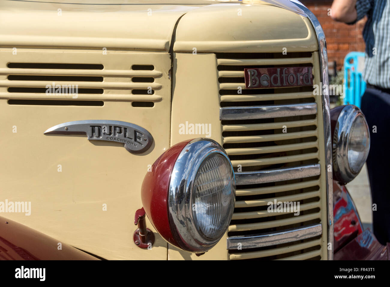 Headlamps and radiator grill of a 1951 Bedford OB vintage motor coach ...