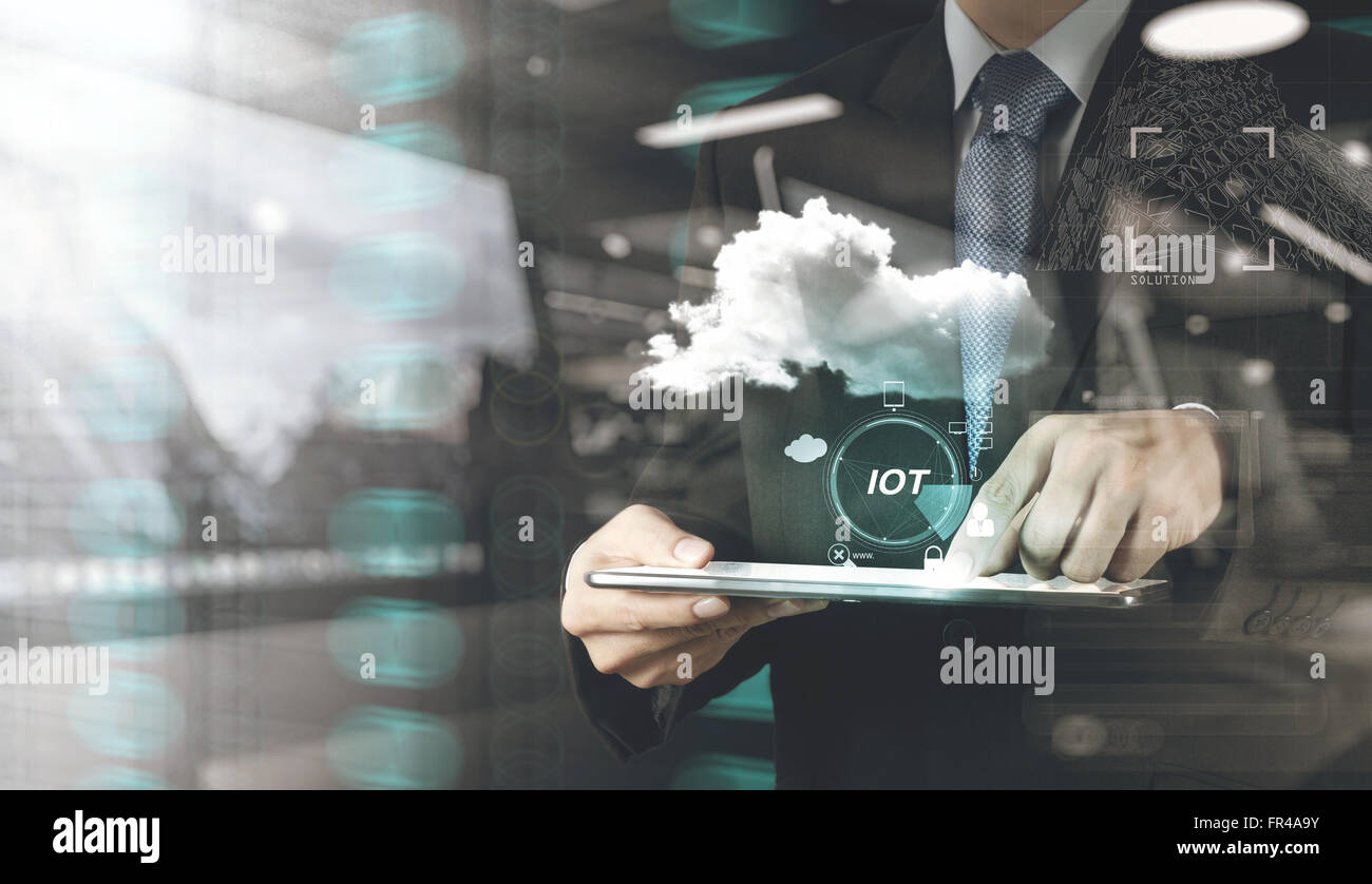 double exposure of hand showing Internet of things (IoT) word diagram ...