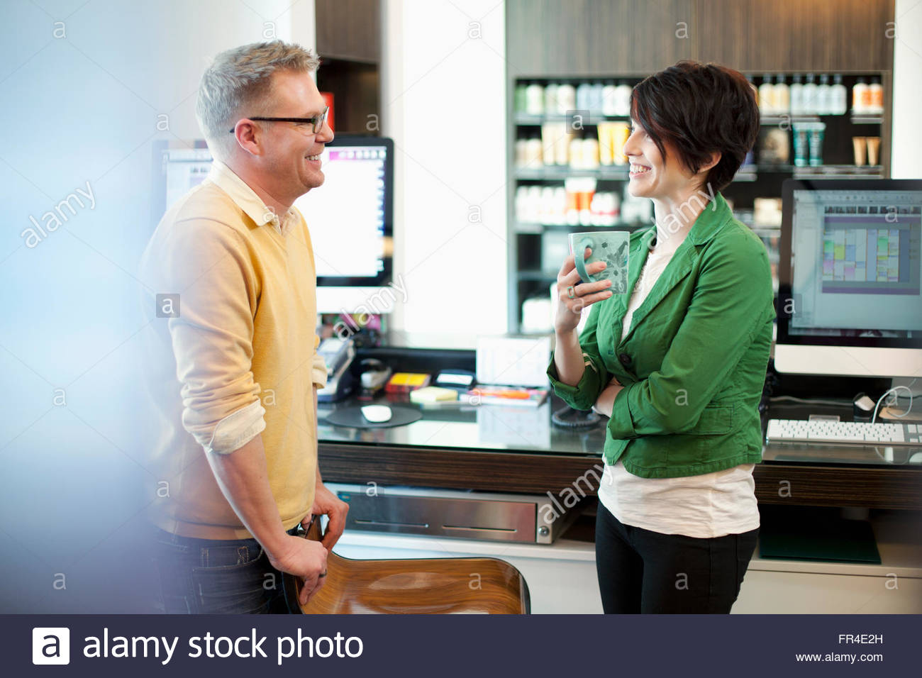 hairstylists working in salon Stock Photo - Alamy