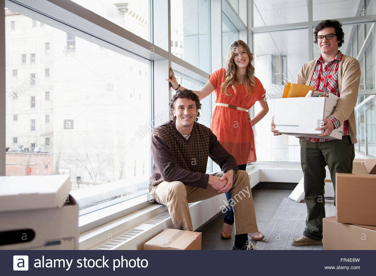 office workers moving in Stock Photo - Alamy