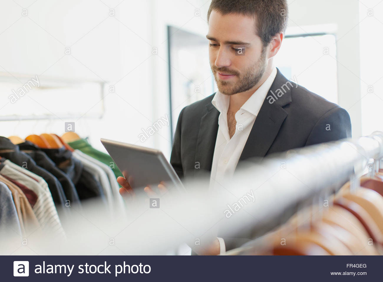 Mens clothing store owner hi-res stock photography and images - Alamy