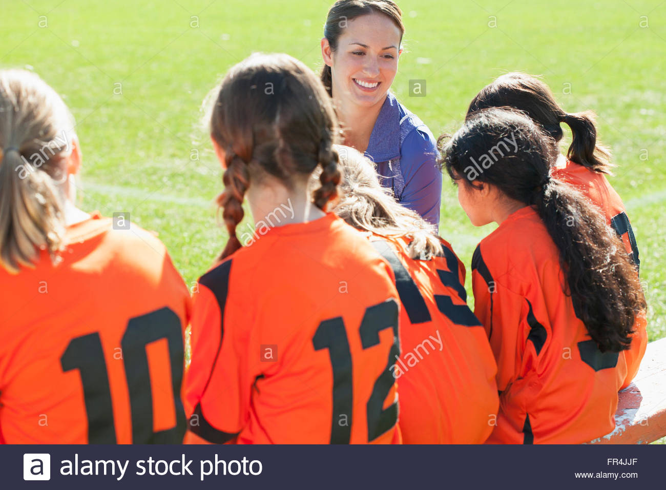 Coach children team hi-res stock photography and images - Alamy