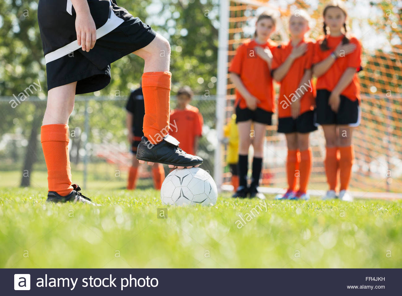 Girls soccer kick hi-res stock photography and images - Alamy