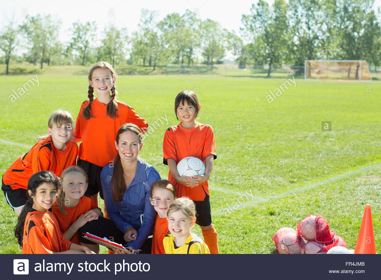 Coach children team hi-res stock photography and images - Alamy