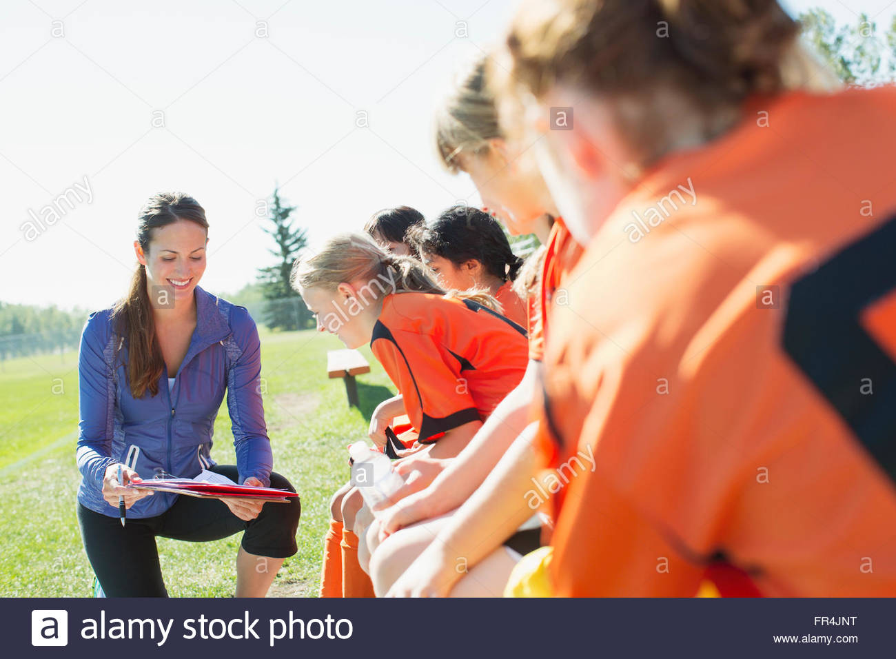 Coach children team hi-res stock photography and images - Alamy