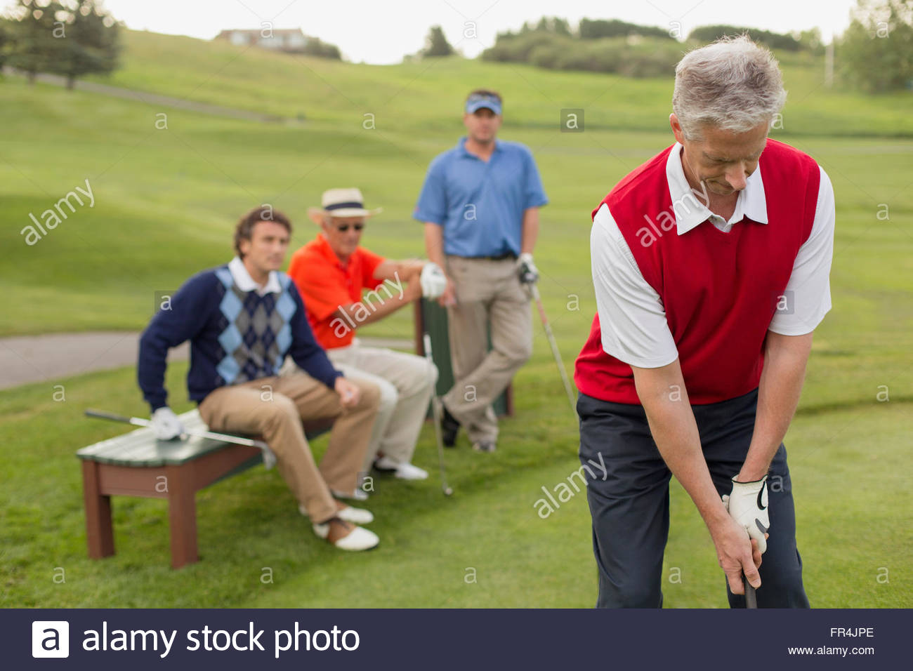 Four golfers driving off hi-res stock photography and images - Alamy