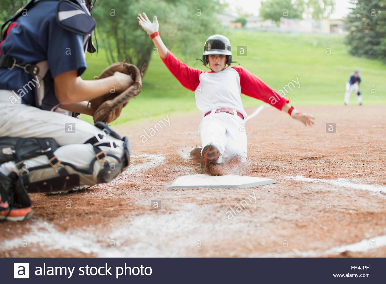 Home plate baseball slide hi-res stock photography and images - Alamy