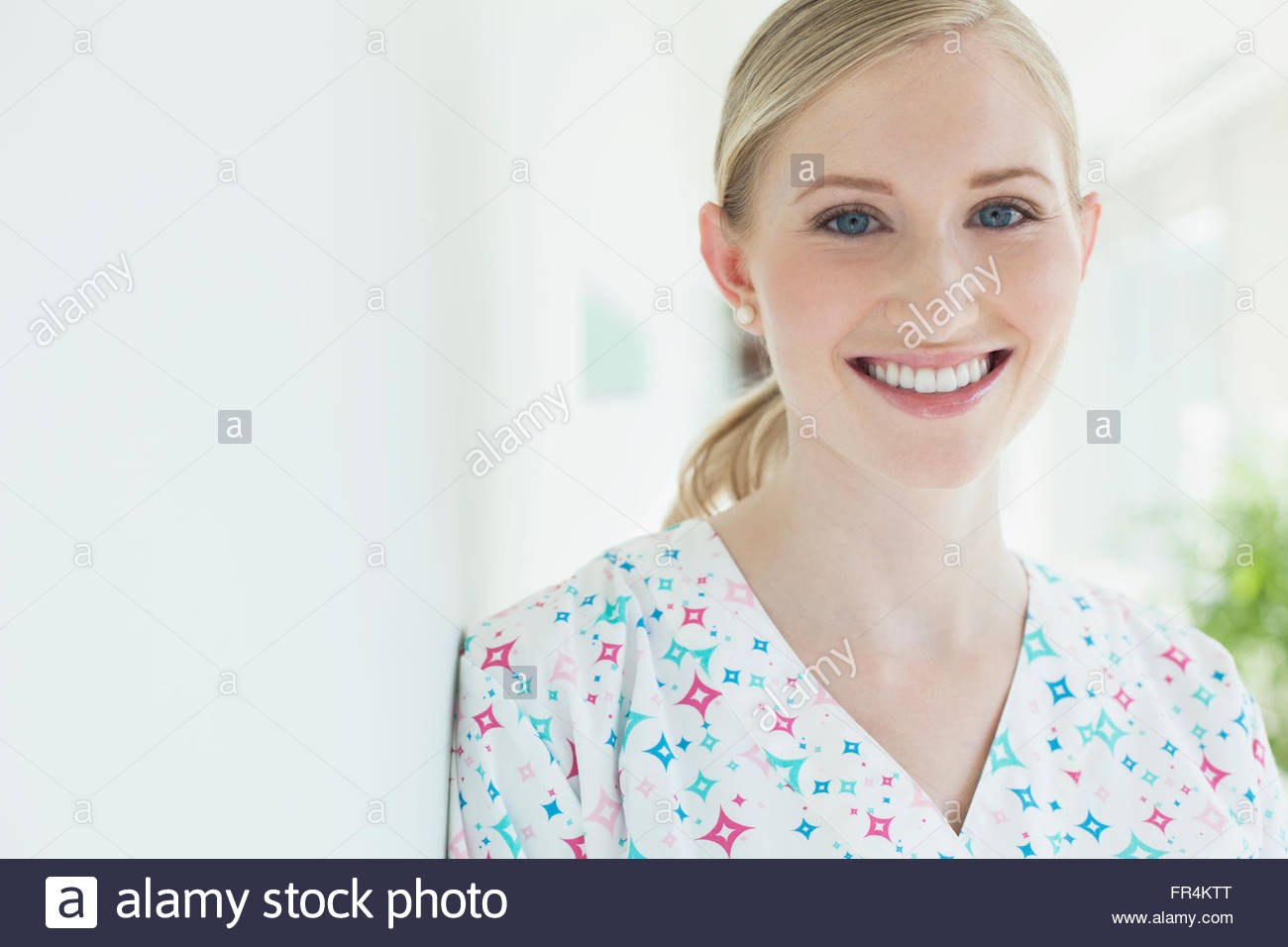 portrait of pretty young adult female nurse Stock Photo - Alamy