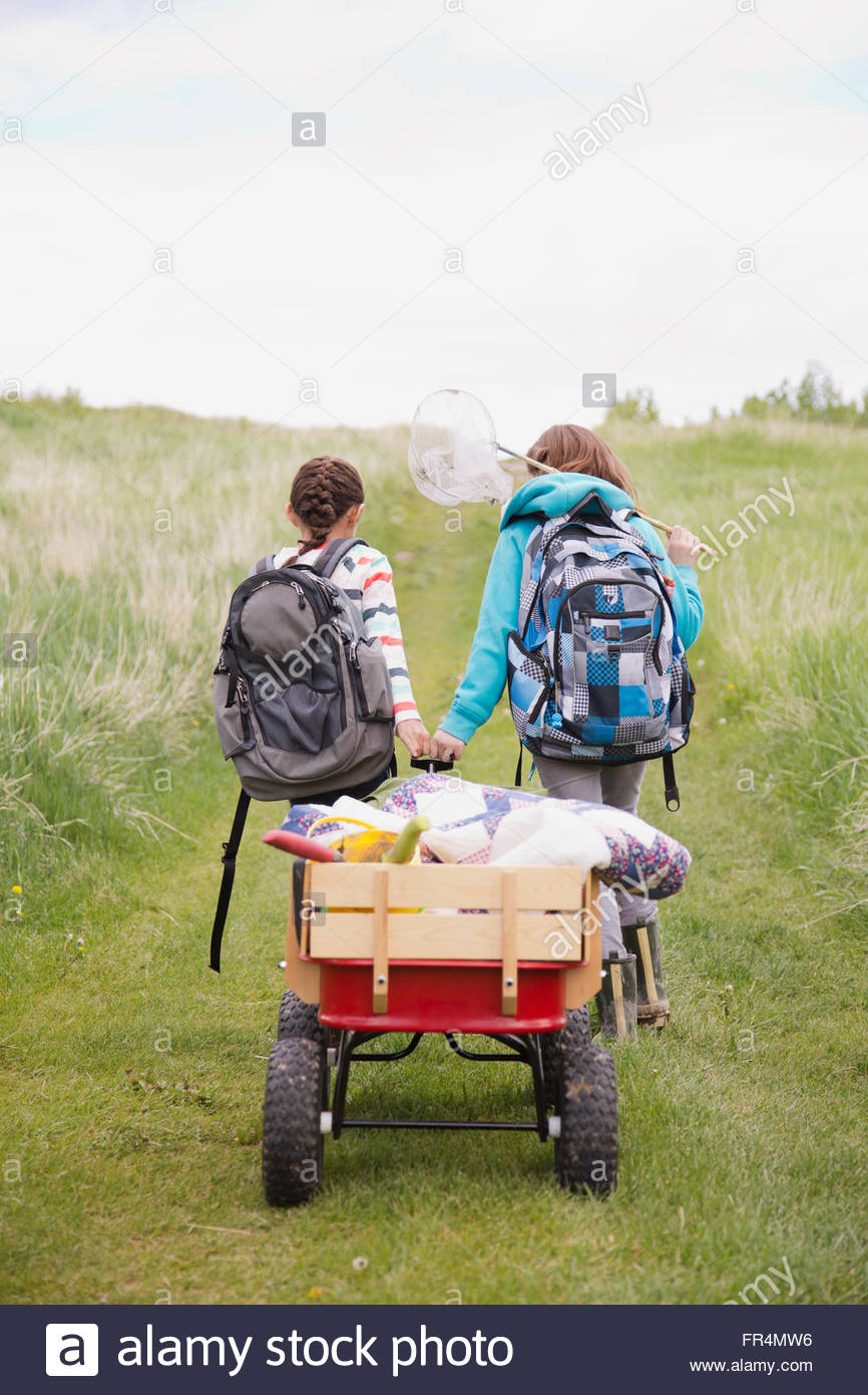 Child pulling backpack school hi-res stock photography and images - Alamy